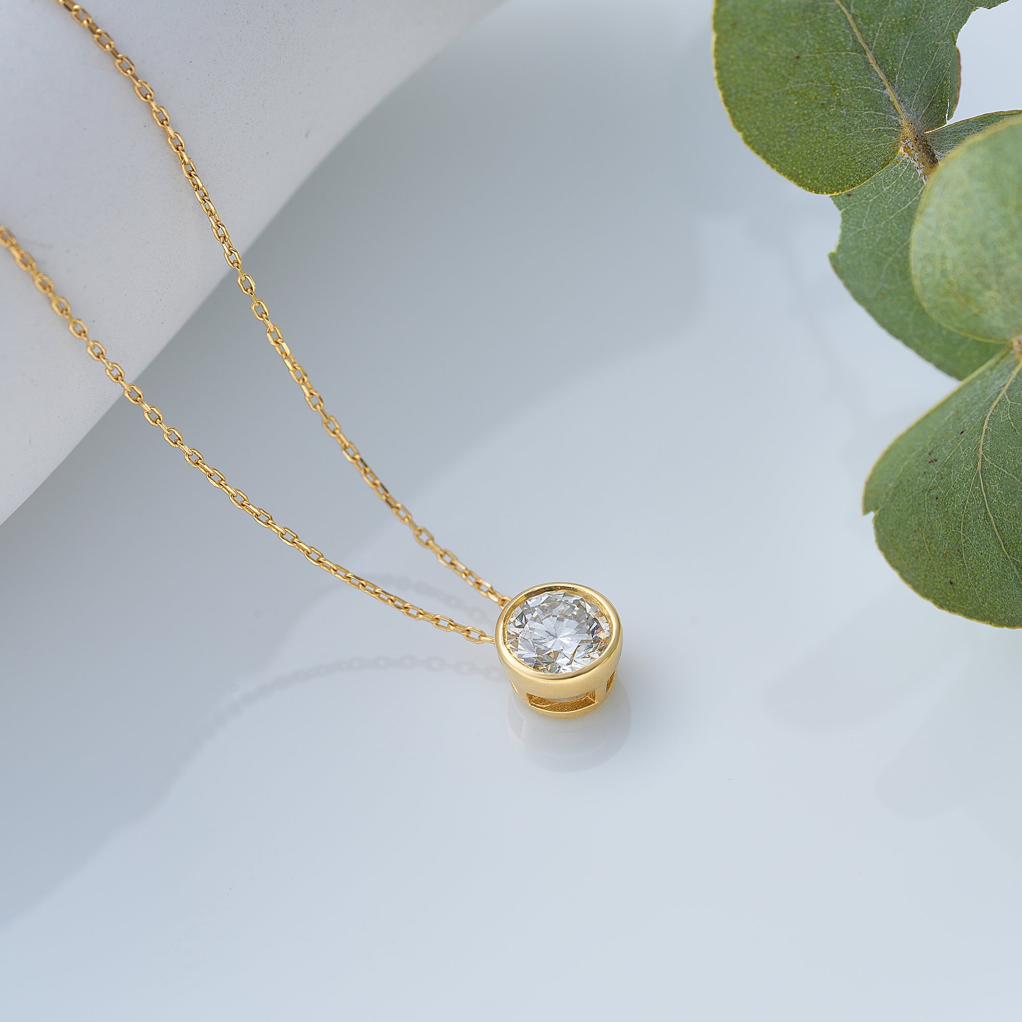 Bezel set diamond pendant store